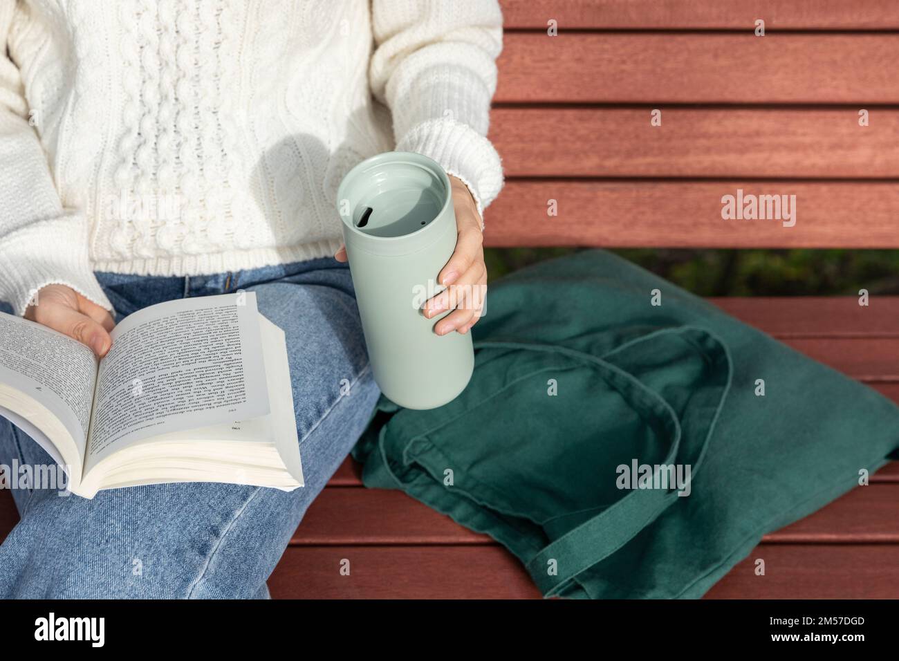 eco friendly habits hand gesture using tumbler in cafe Stock Photo - Alamy