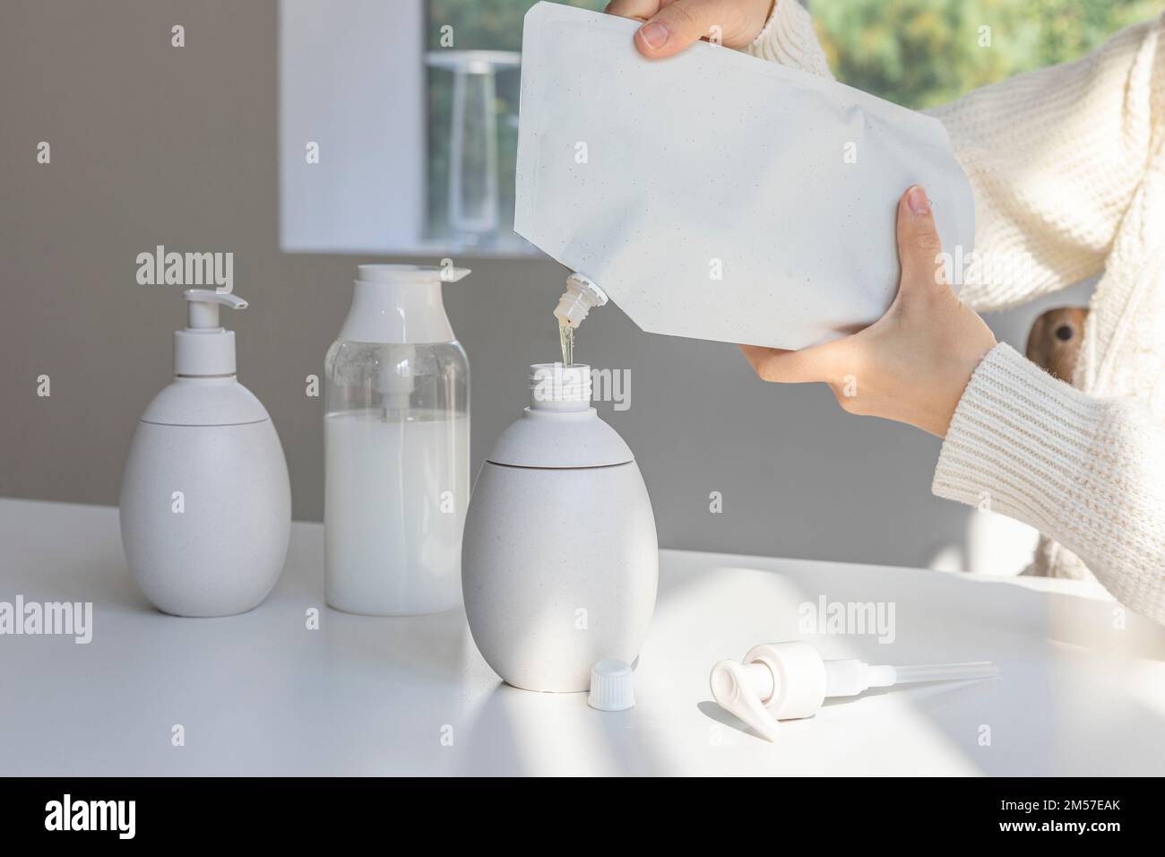 eco friendly habits hand gesture using refill containers Stock Photo ...