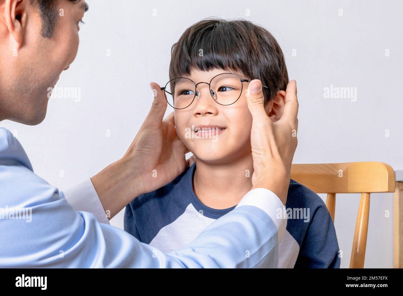 korean asian child in ophthalmic clinic eyesight test Stock Photo - Alamy