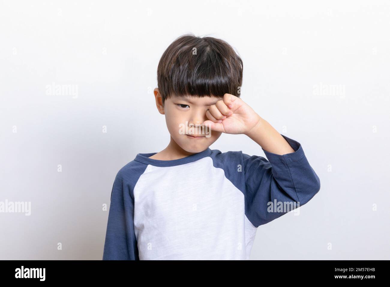 Child rubbing his eyes hi-res stock photography and images - Alamy