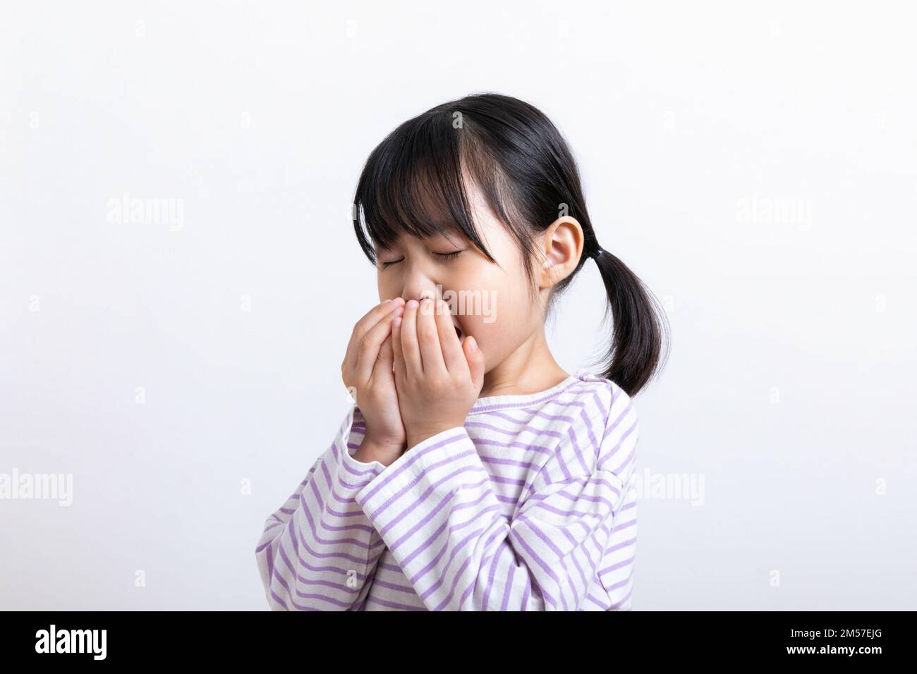 Asian Korean child coughing Stock Photo - Alamy