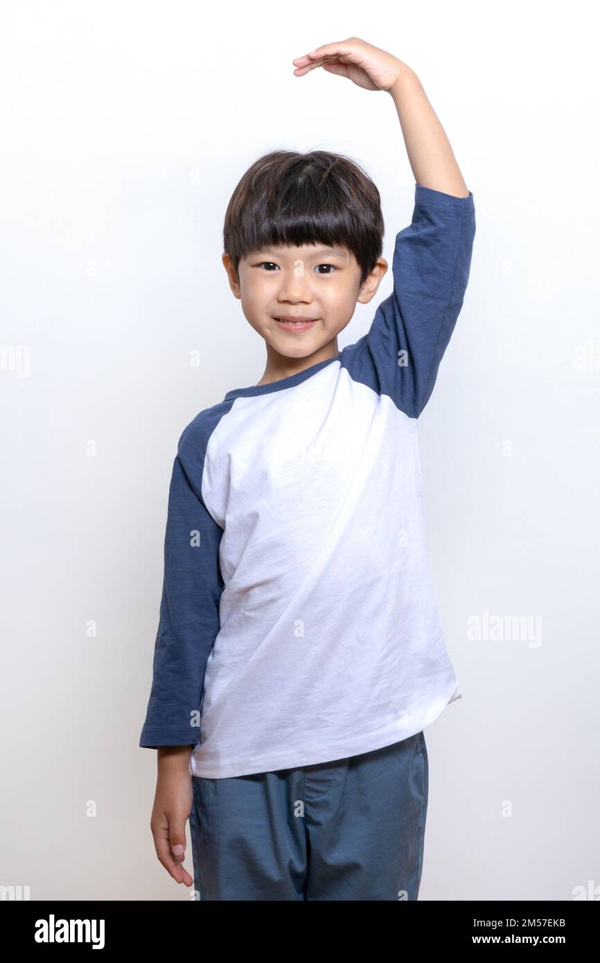 Asian Korean child measure one's height Stock Photo - Alamy