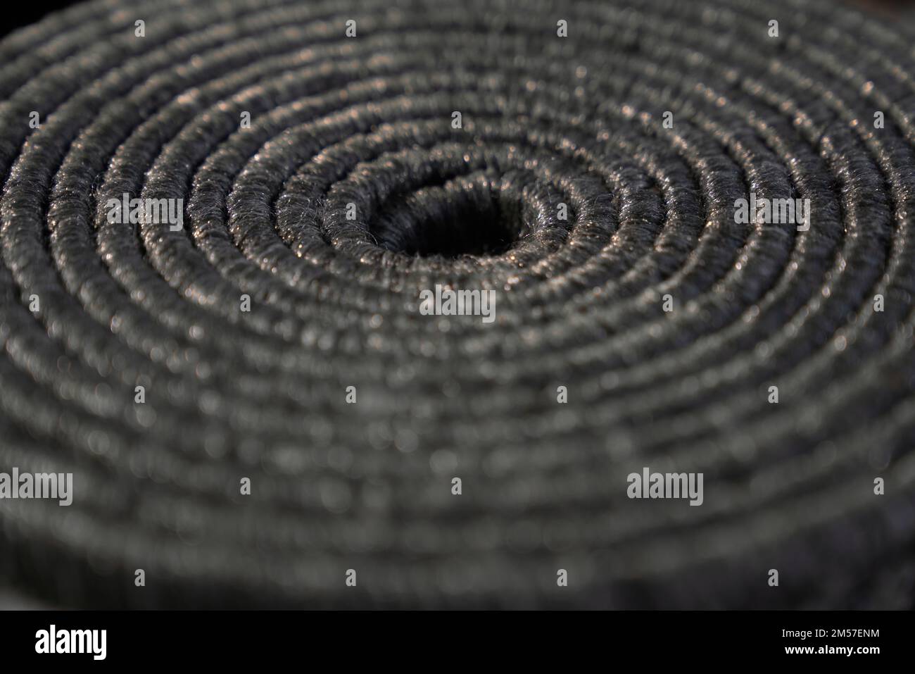 Twisted, coiled natural dark jute pattern as background. Close up of ...