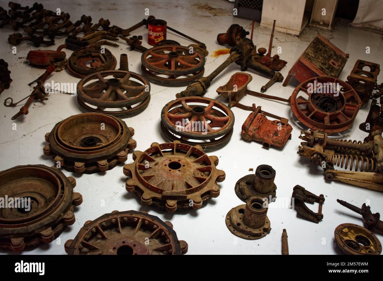 Old auto parts laid out on the floor at the American Heritage Museum ...