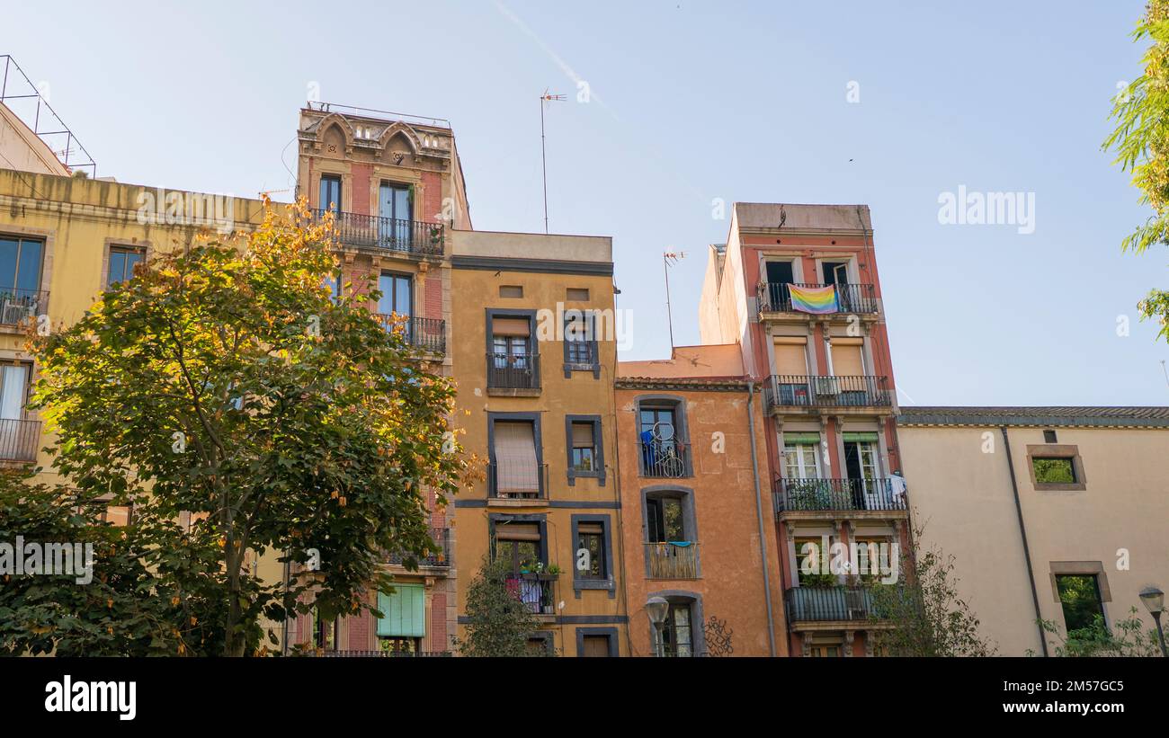 A Beautiful sunny view of old buildings behind autumn trees Stock Photo ...