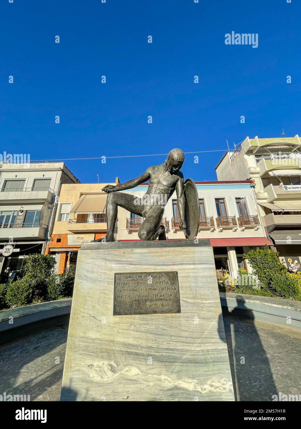 Sculpture of a Spartan warrior in the center of the historical Greek ...