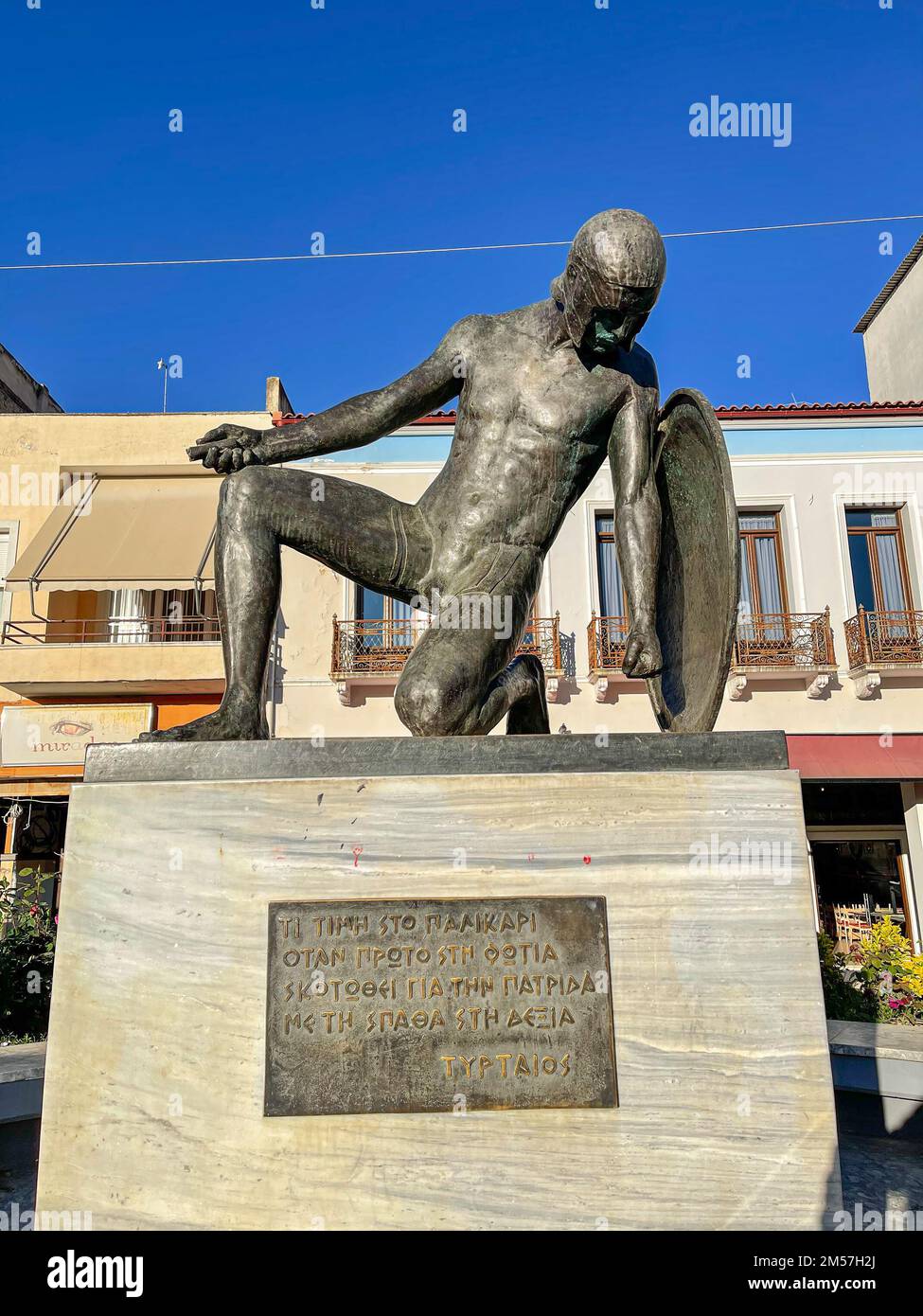 Sculpture of a Spartan warrior in the center of the historical Greek ...
