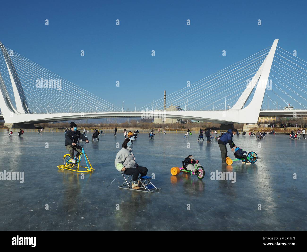 People paly on the ice at Lianshihu Ice Rink in Shijingshan District ...
