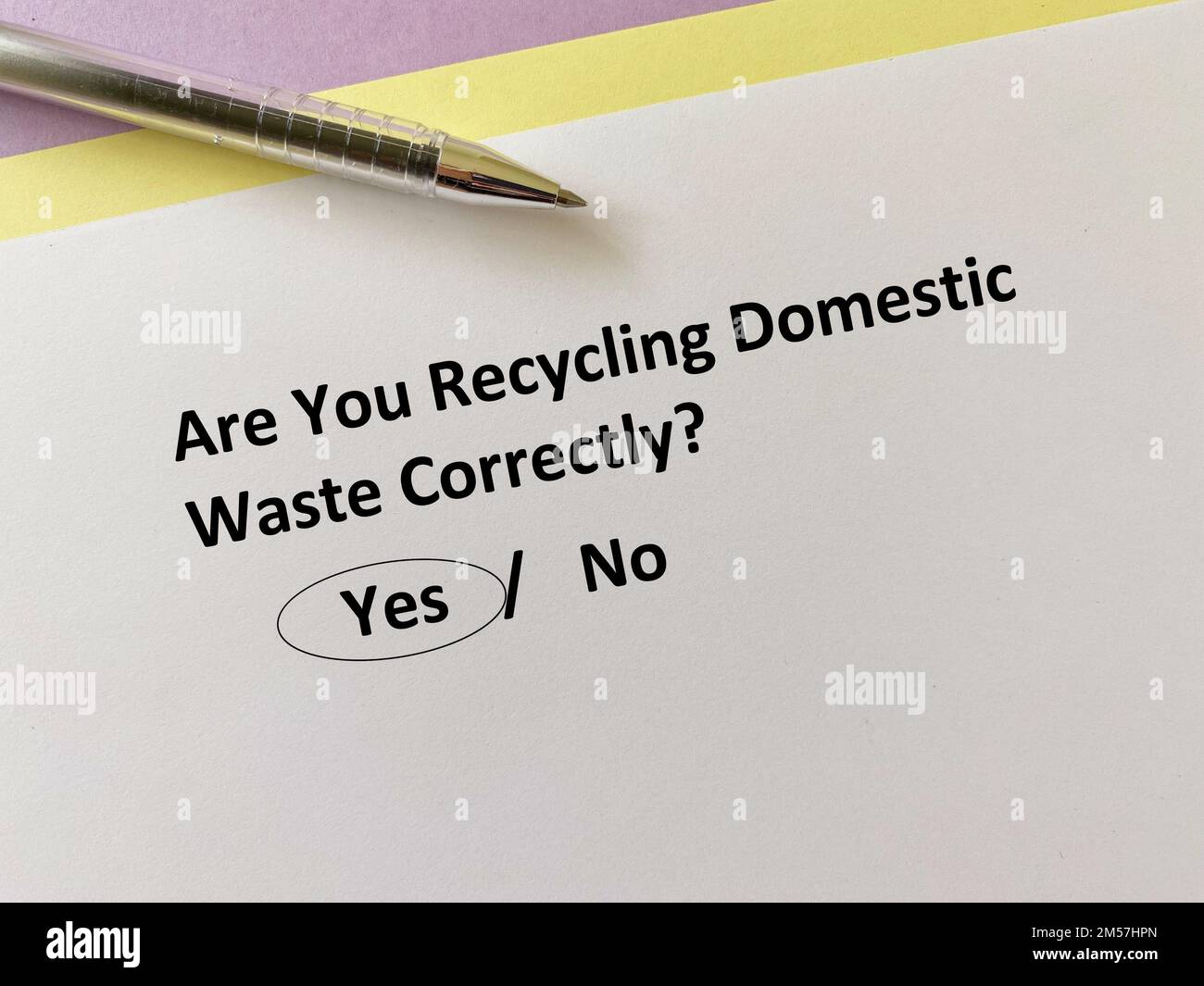 One person is answering question about recycling. He is recycling ...