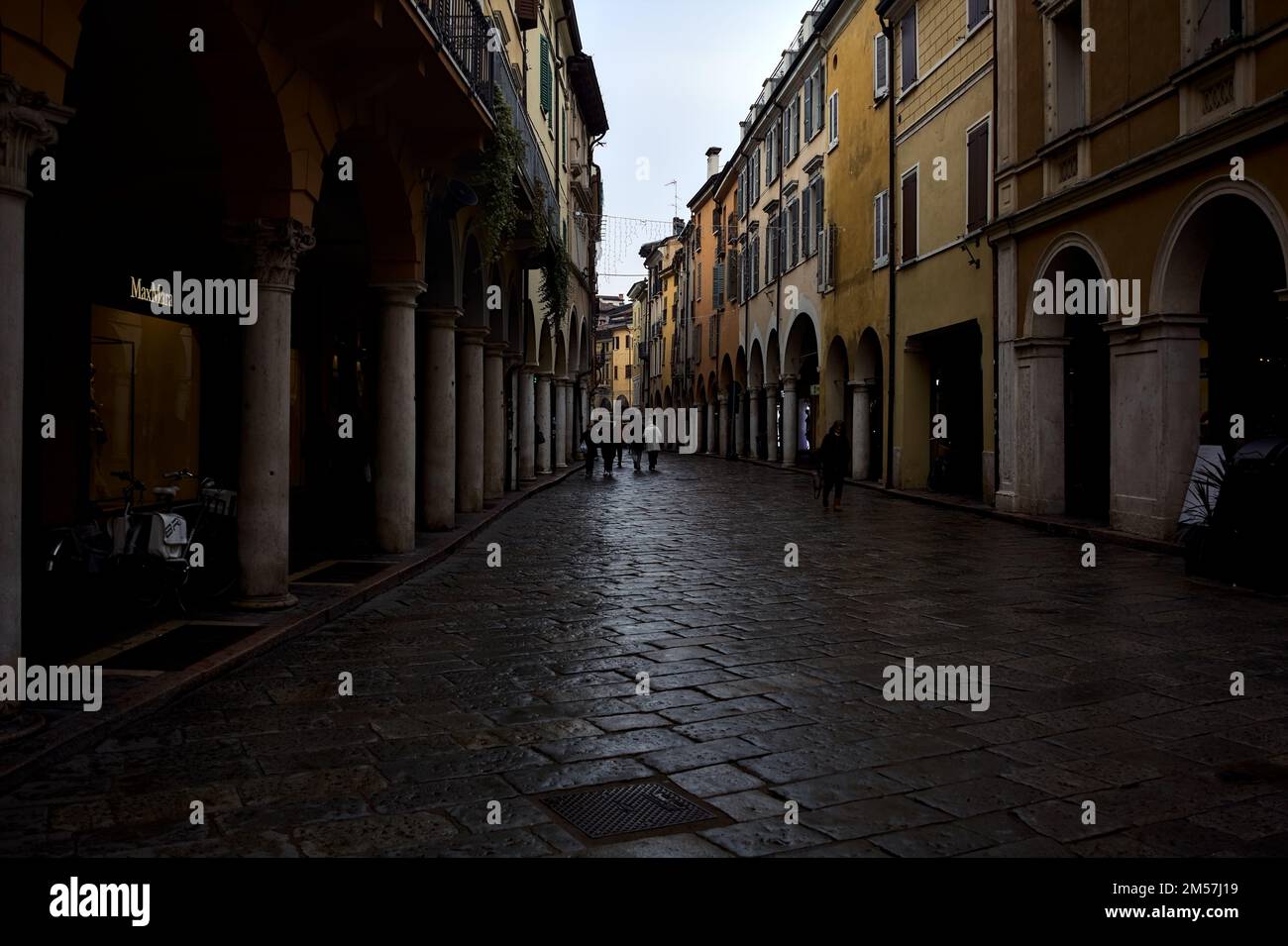 Cobbled street on a cloudy day Stock Photo - Alamy