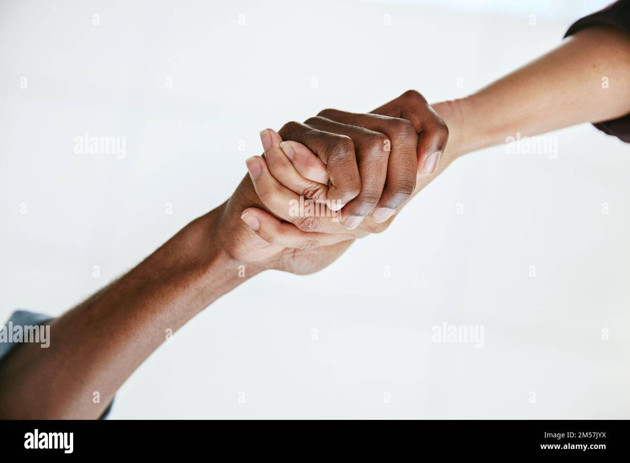 Coming together for a common cause. two people shaking hands Stock ...