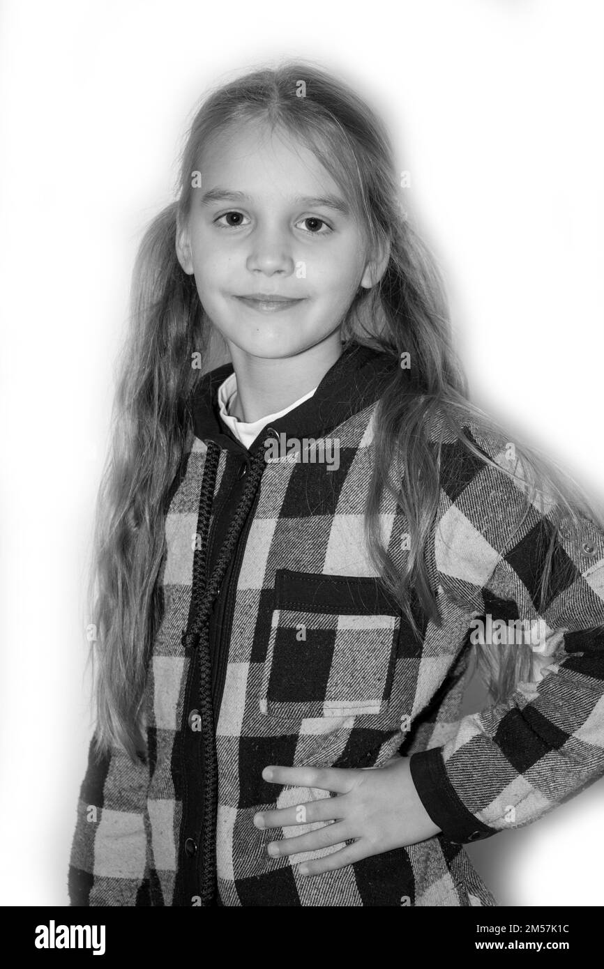 A girl in a checkered shirt on a white background Black and white photo ...
