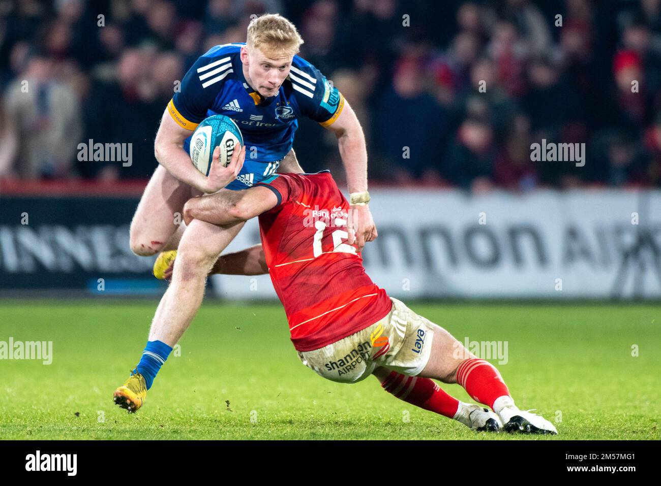 Limerick, Ireland. 27th Dec, 2022. Jamie Osborne of Leinster tackled by ...