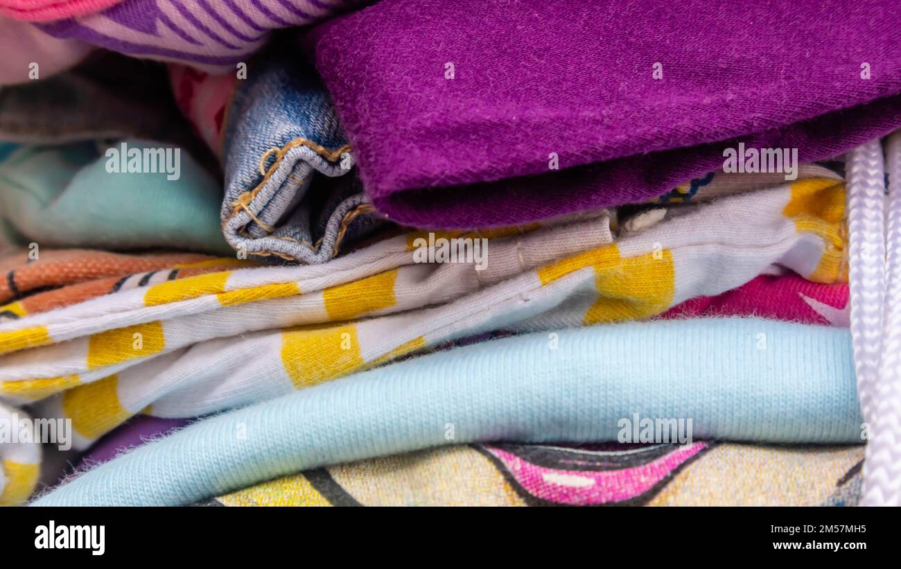 pile of clothes as background Stock Photo - Alamy
