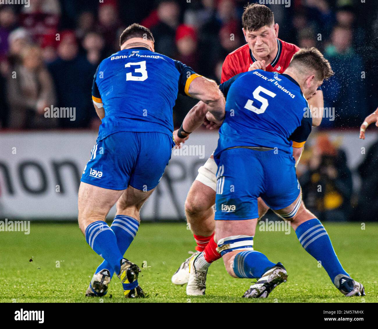 Limerick, Ireland. 26th Dec 2022. Jack O'Donoghue of Munster tackled by ...