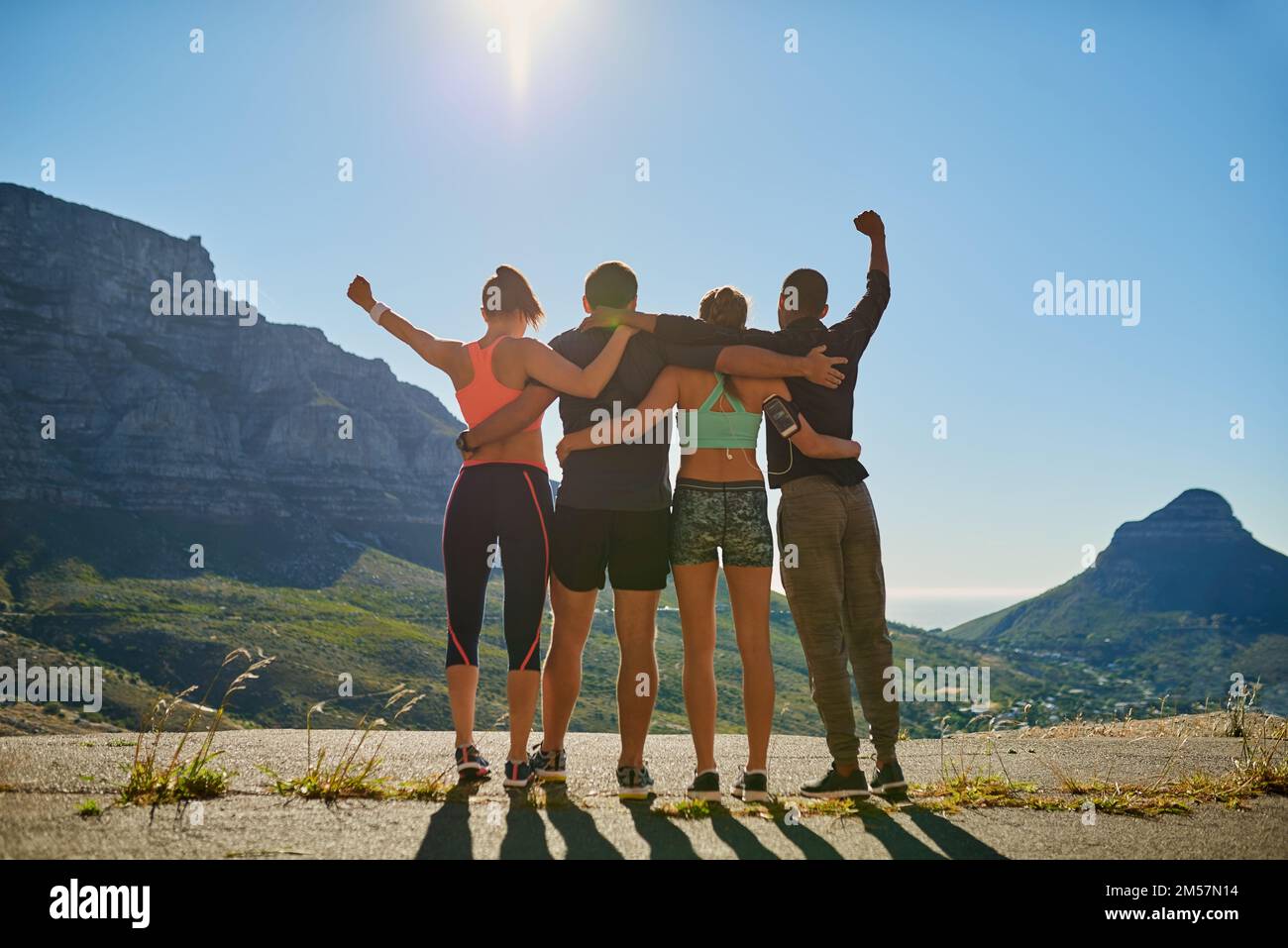 We did it together. a fitness group celebrating after a good workout ...