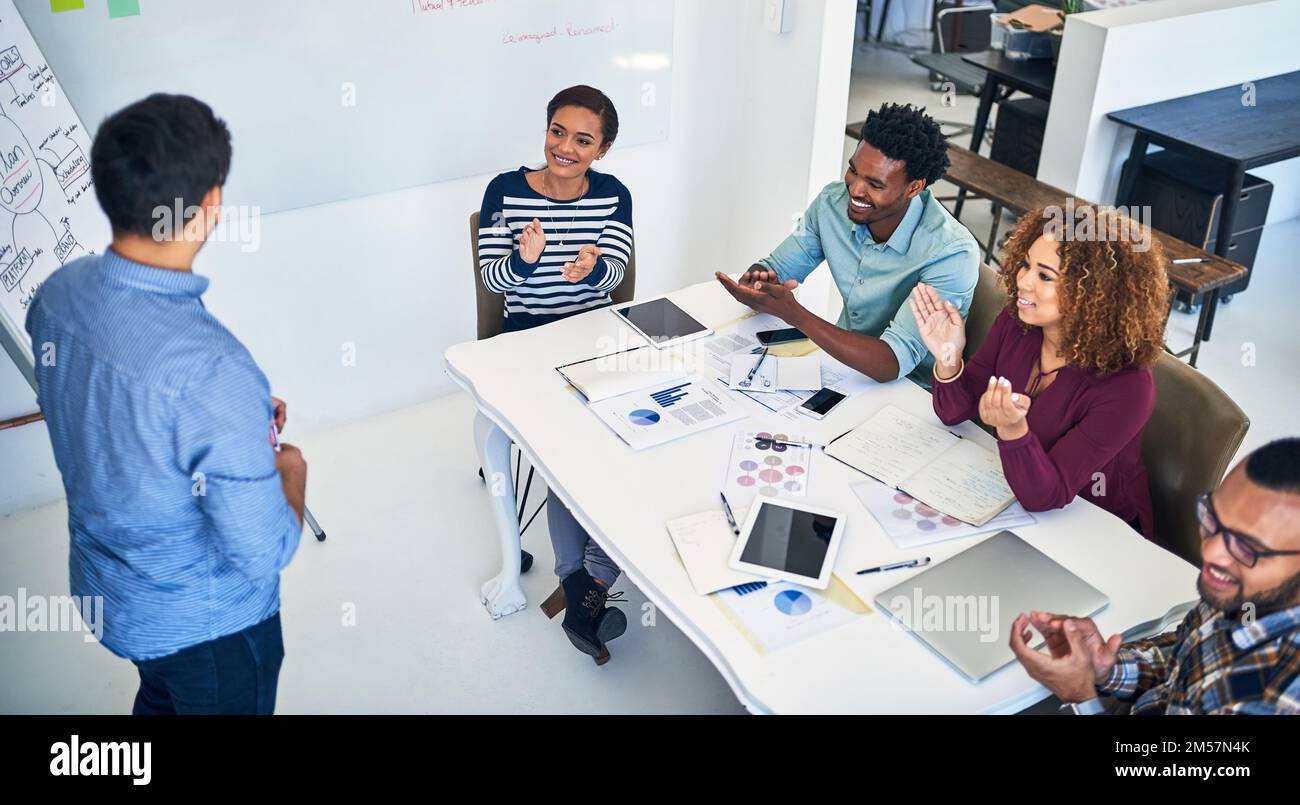 The team are inspired by his impressive presentation. a team of ...