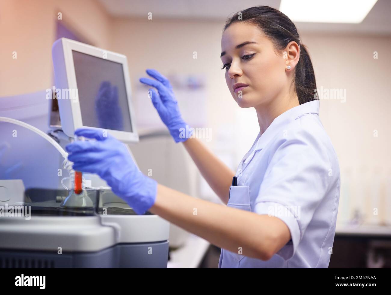 Advanced technology for advanced medical research. a young scientist ...