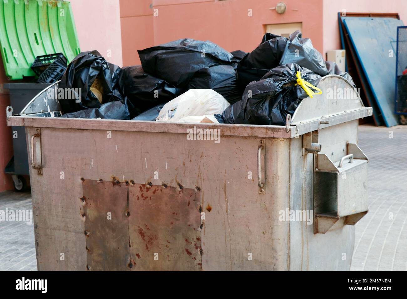 waste management system in public perspective. huge rubbish bin for ...