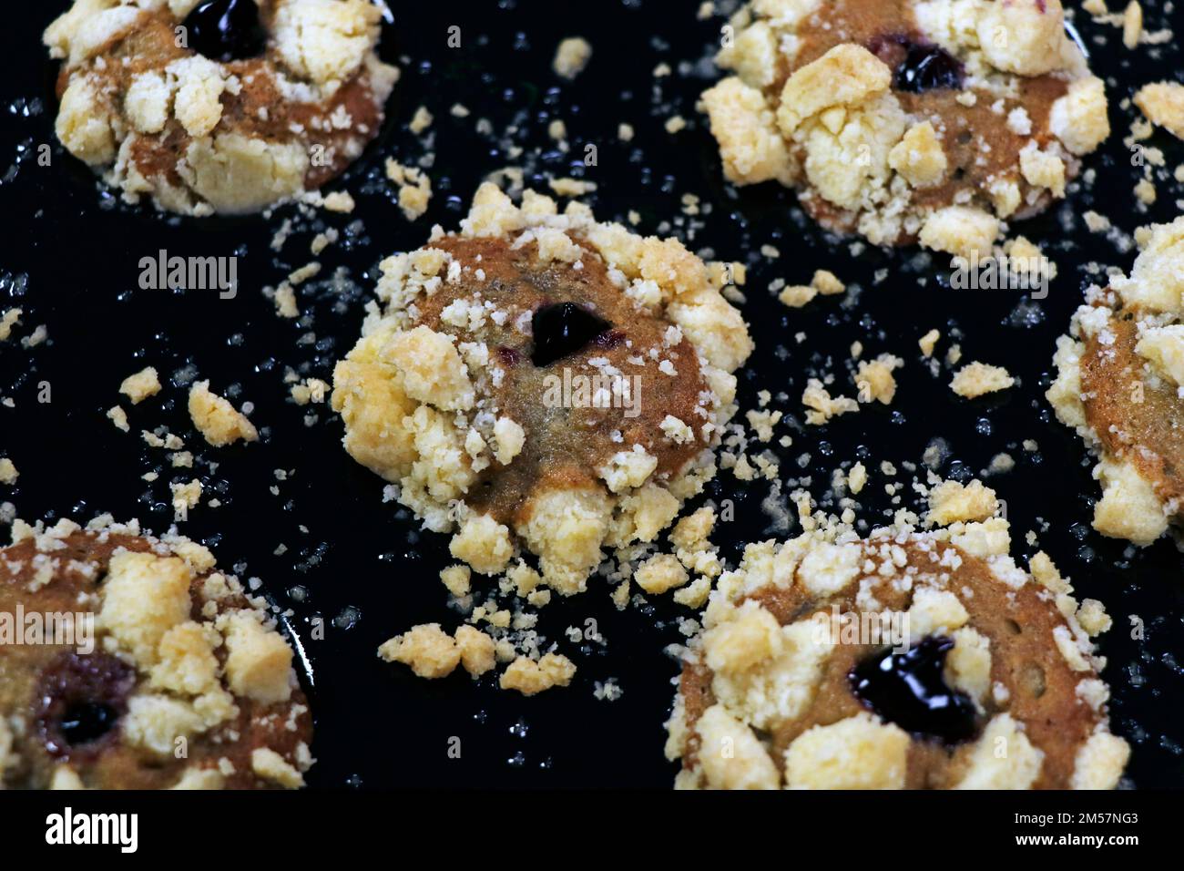 chocolate stuffed baked muffins or cupcakes in a bakery sheet Stock ...