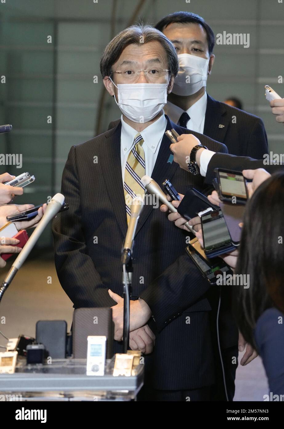 Japanese reconstruction minister Kenya Akiba meets the press at the ...