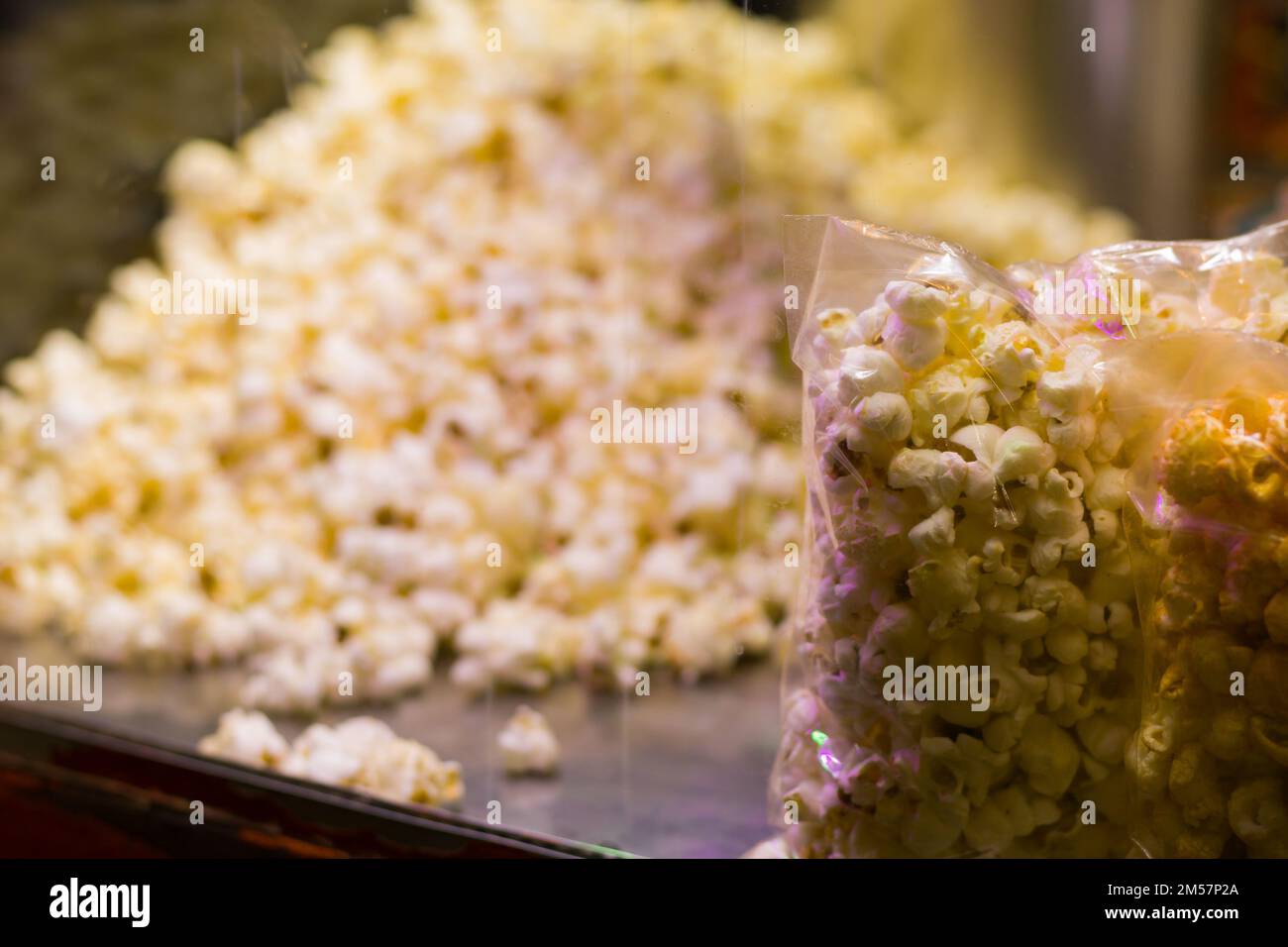 popcorn kept in counter for selling in transparent plastic packets ...