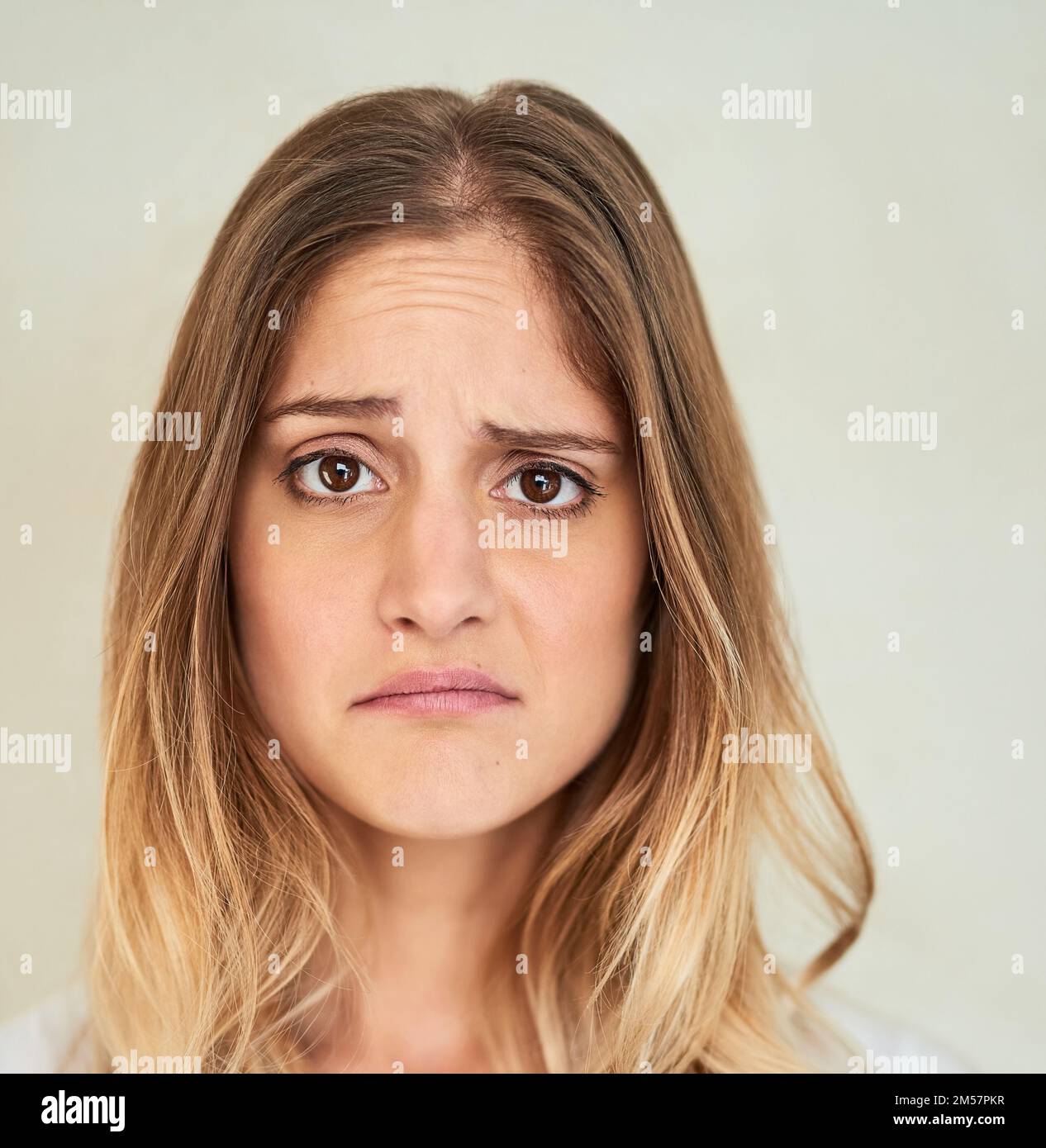 Woman making sad face portrait hi-res stock photography and images - Alamy