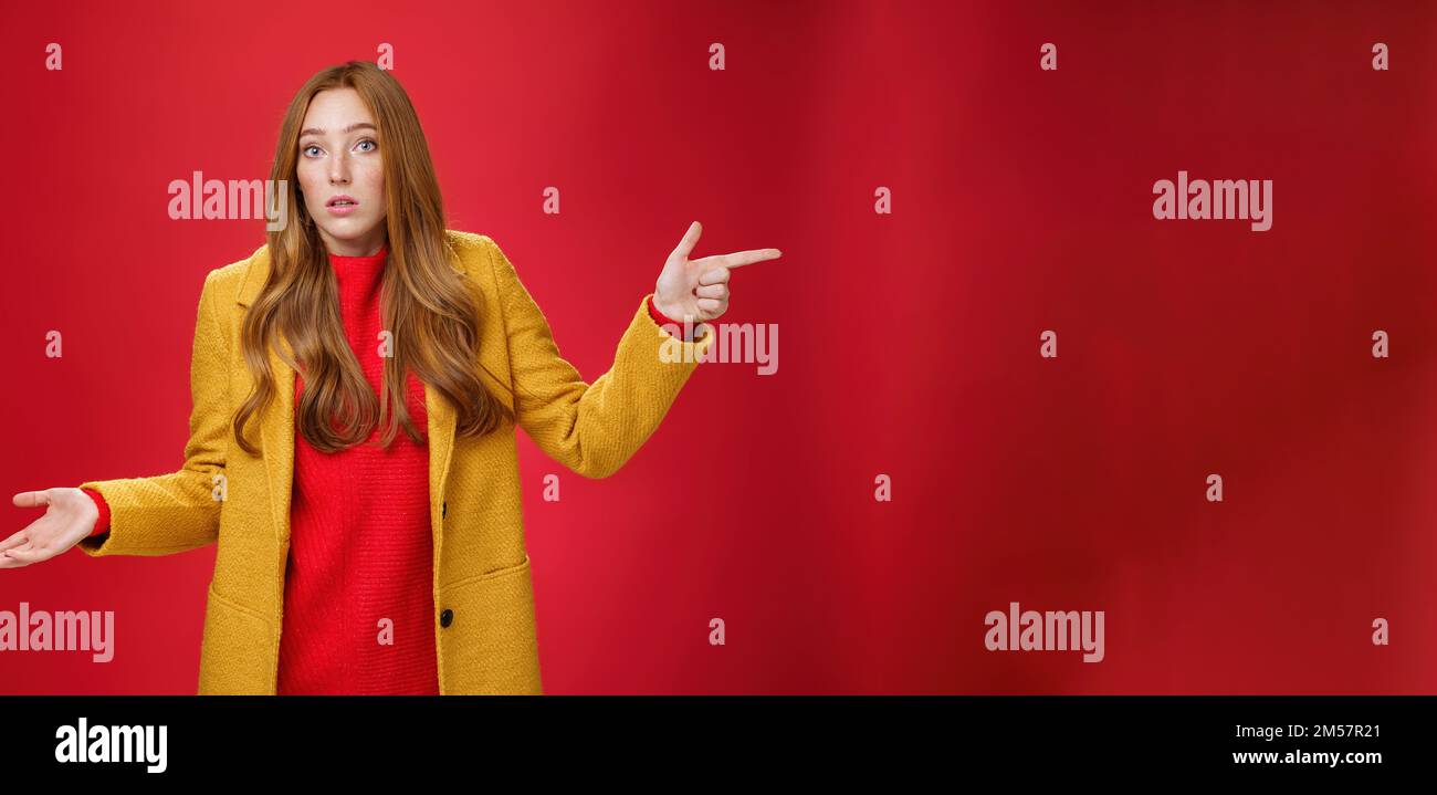 Woman missed client posing confused and unaware how happened shrugging ...