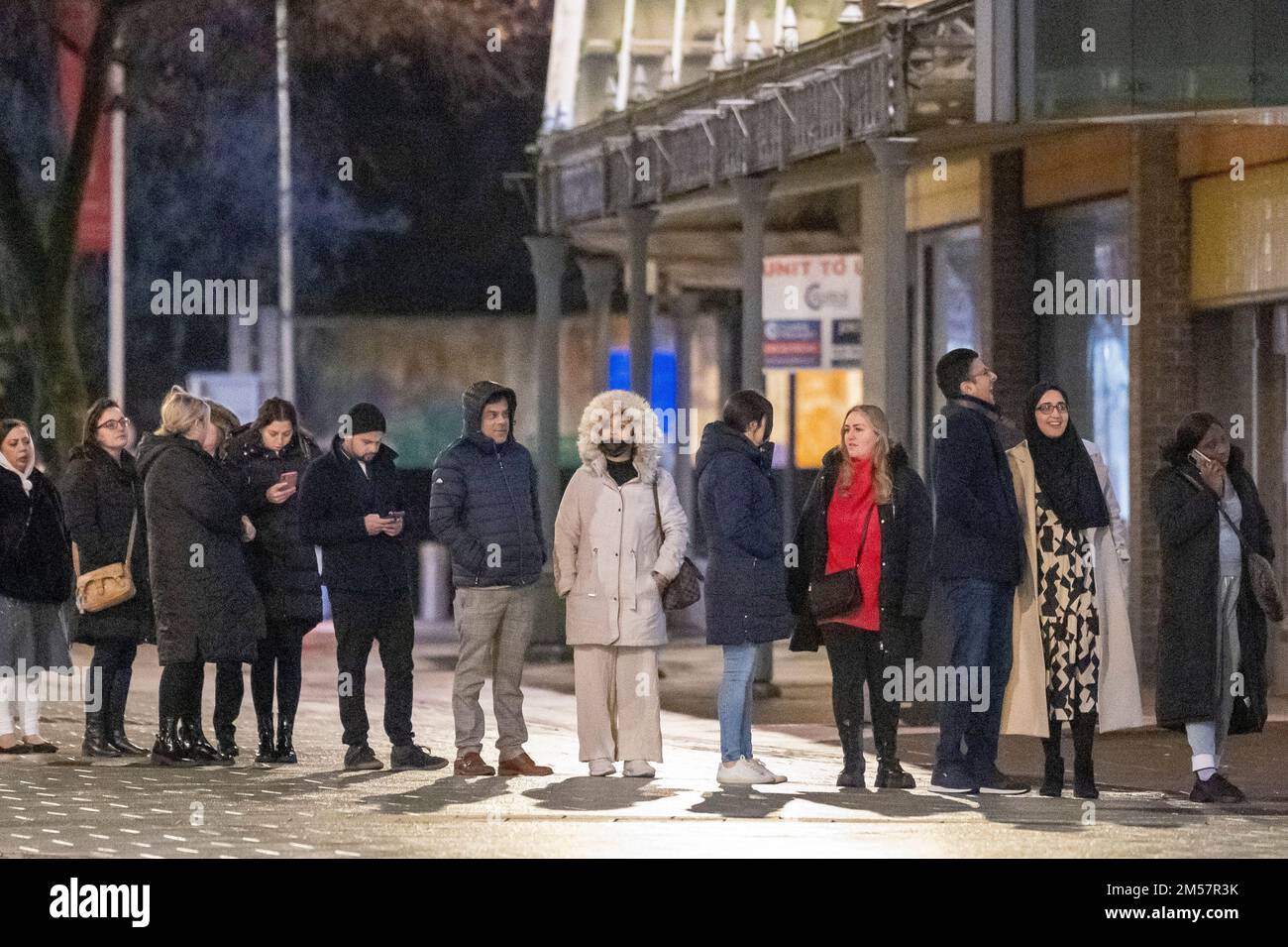 CARDIFF, WALES - DECEMBER 27: Shoppers queue from the early hours of ...