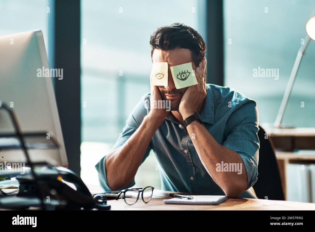 Thats it, Im done. a tired young businessman working at his desk with ...