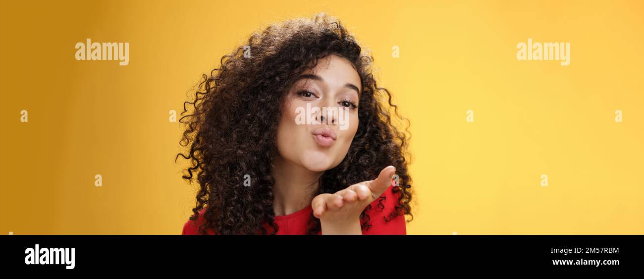Sensual flirty and tender attractive girlfriend with curly hairstyle ...