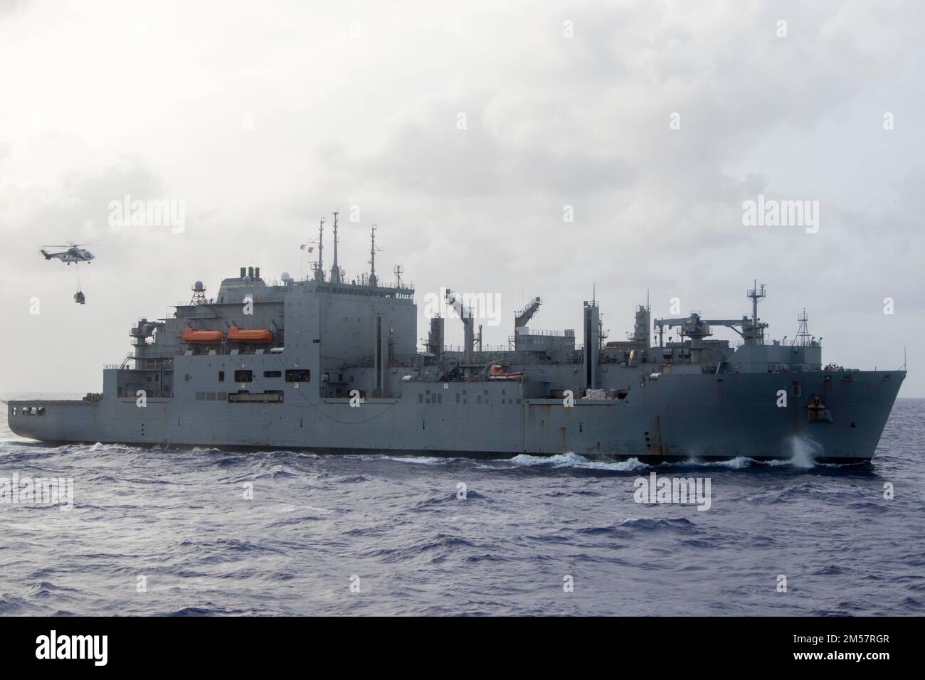 PACIFIC OCEAN (Dec. 4, 2022) – An MH-60S Seahawk helicopter retrieves ...