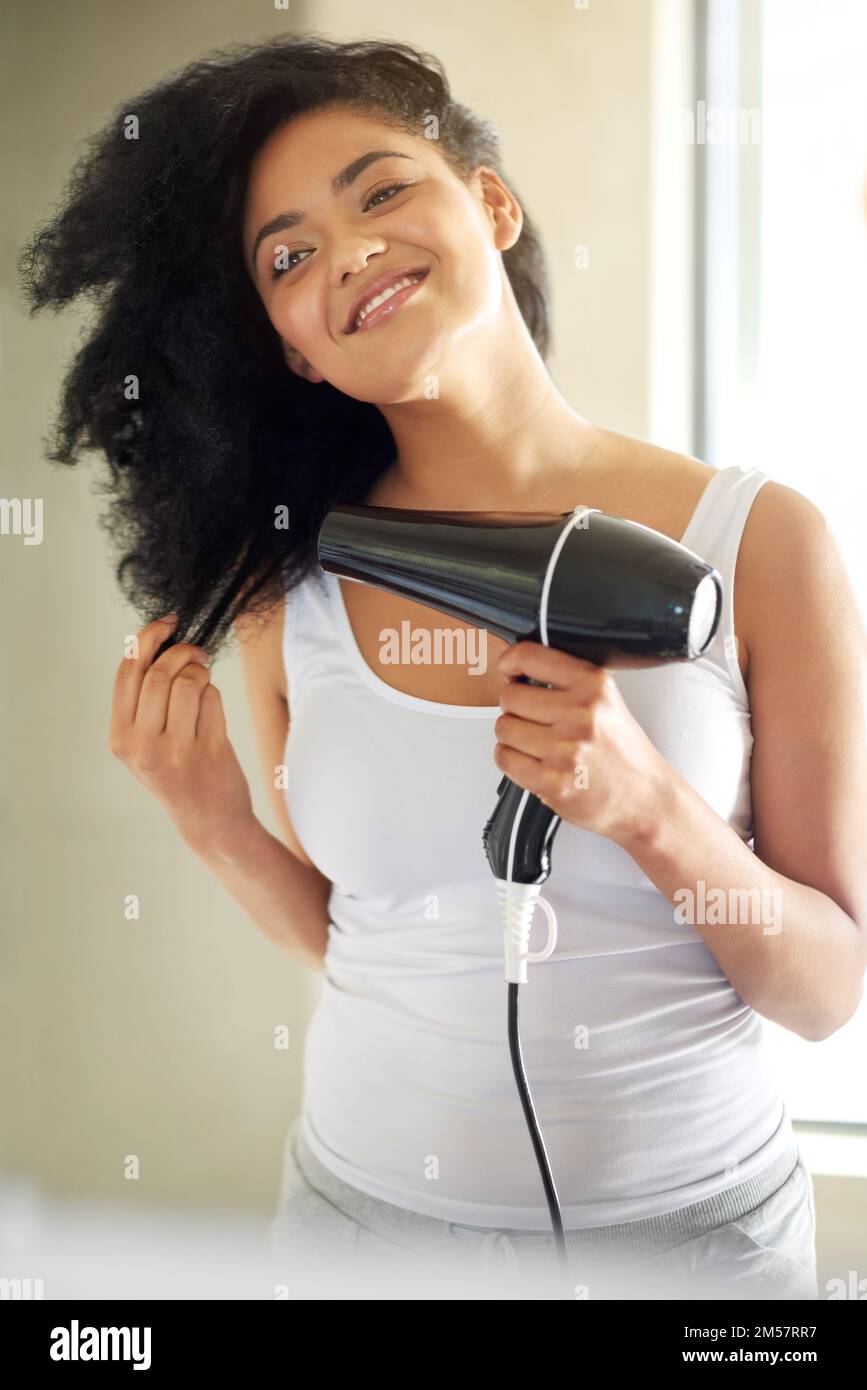 Women drying their hair hi-res stock photography and images - Alamy