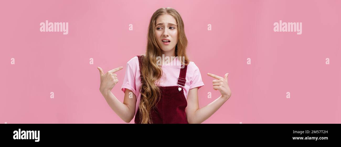 Self-assured arrogant young female student with high ego standing cocky ...