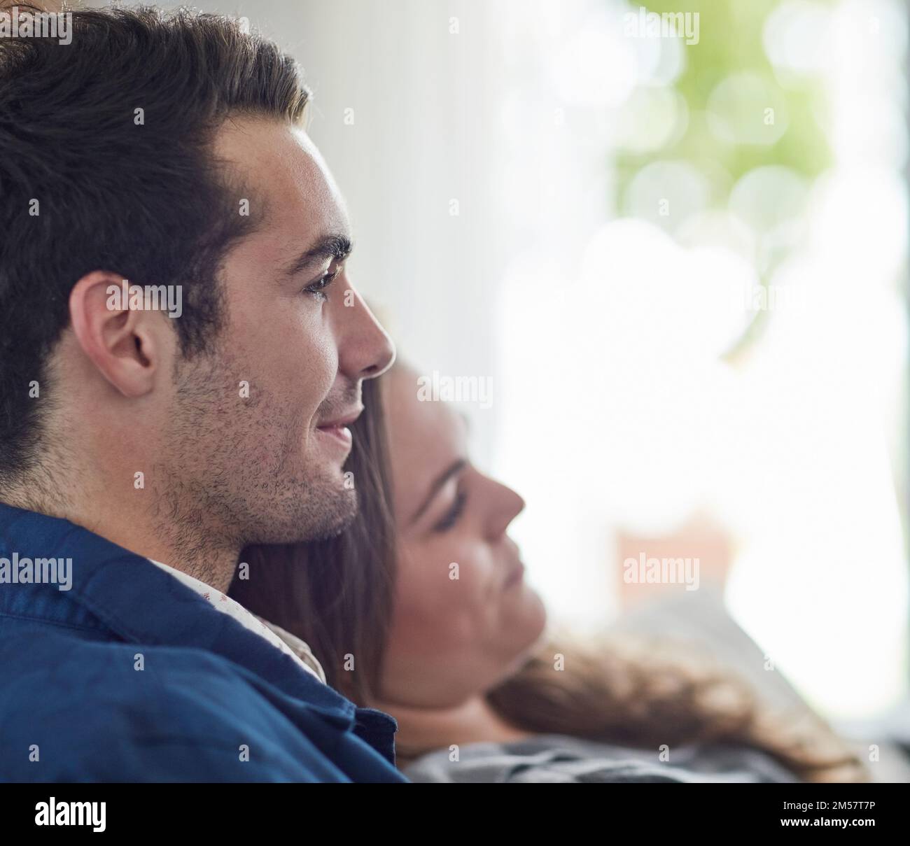 You cant spell weekend without we. a happy young couple relaxing on the ...