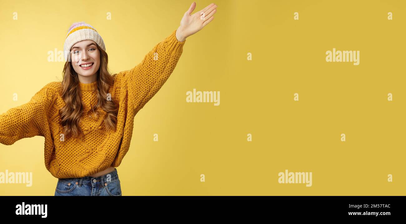 Friendly happy charming smiling cute girl inviting friends joyfully ...