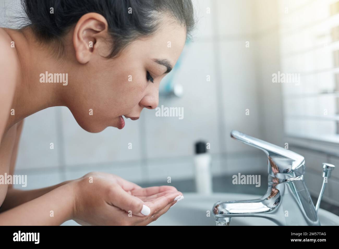 Sticking to a strict routine to keep her skin healthy. an attractive ...