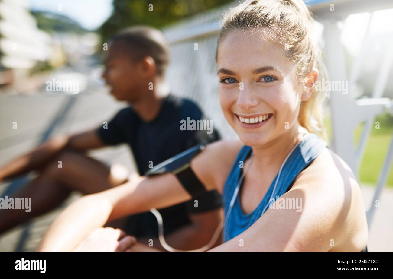 We love exercising together. two young people getting ready for their ...
