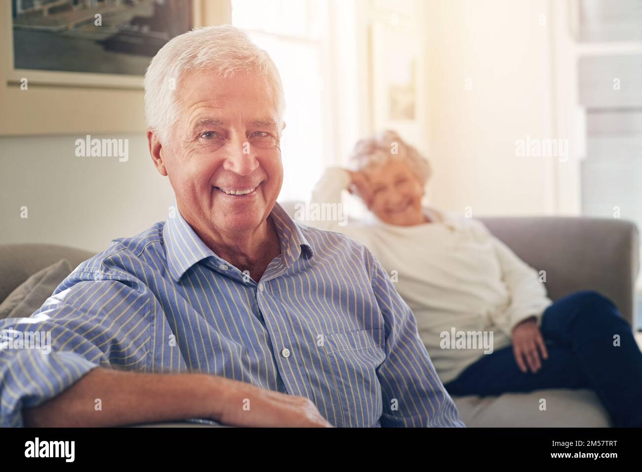 Resting their retirement out. Portrait of a senior man relaxing at home ...