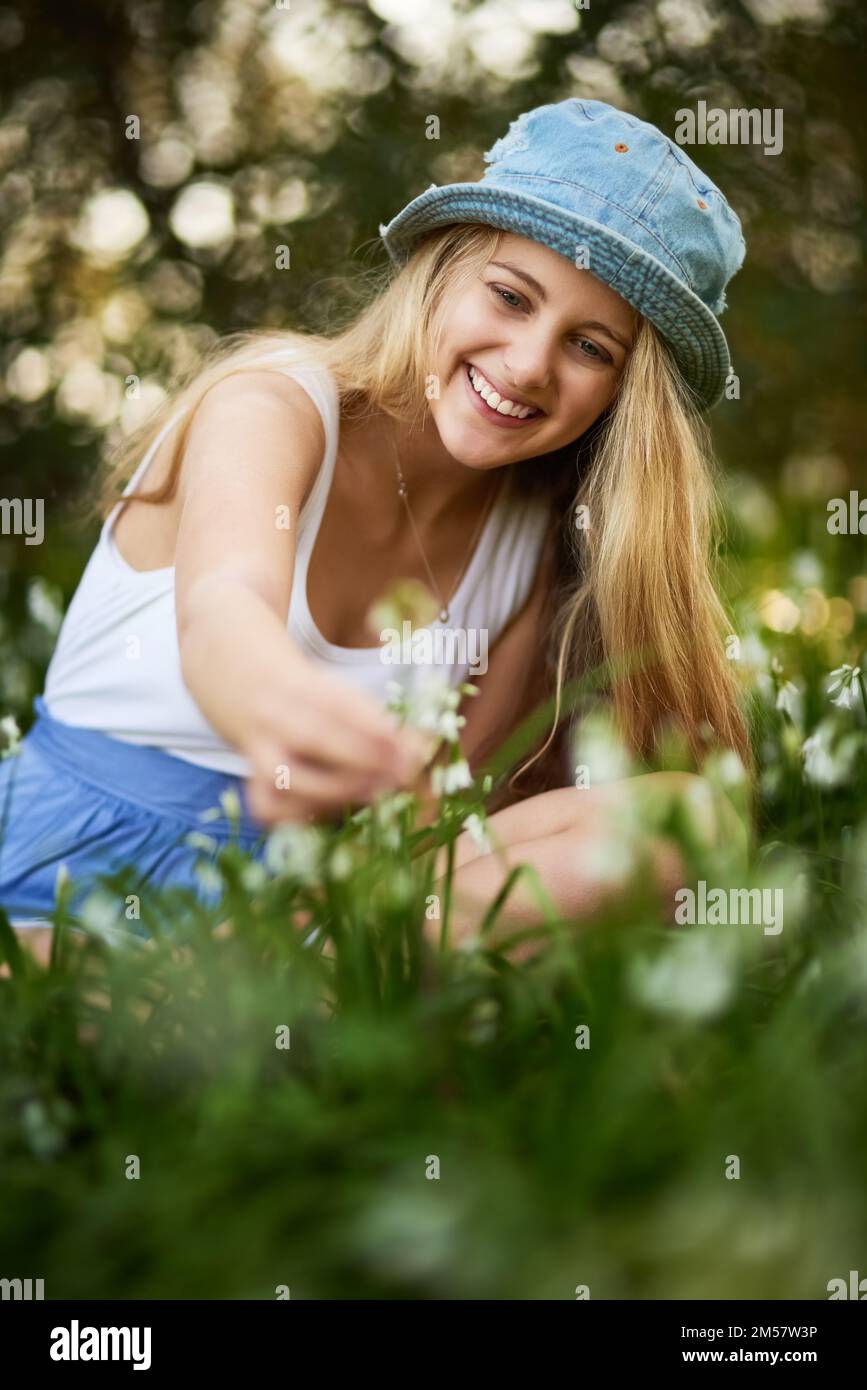Immerse yourself in nature. an attractive young woman spending the day outdoors Stock Photo - Alamy