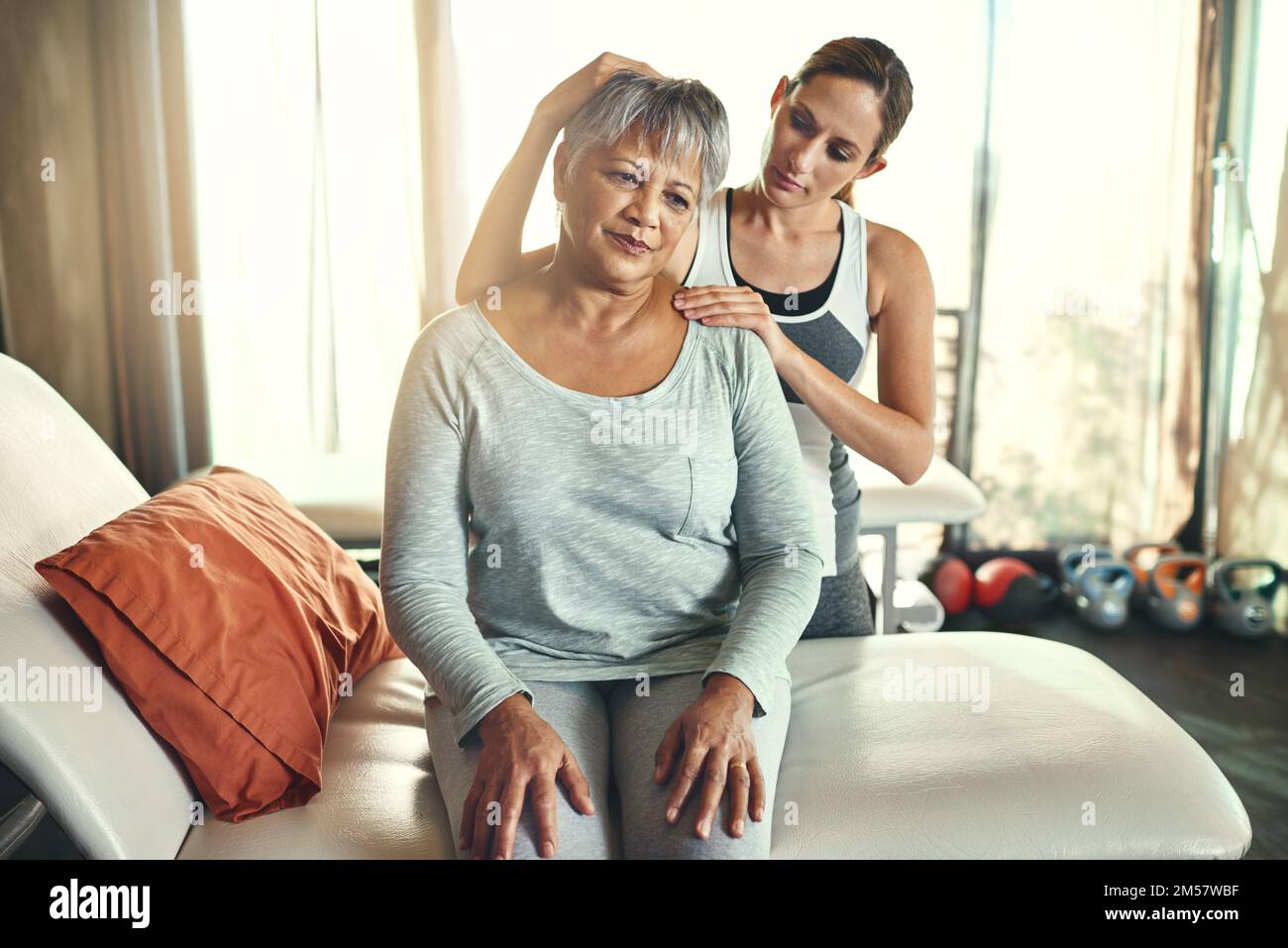 Elderly woman being treated hi-res stock photography and images - Alamy