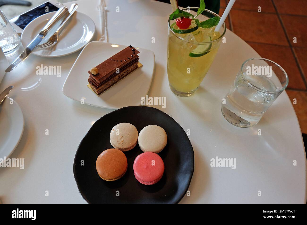 French chocolate opera cake and assorted macaron(macaroon) served with ...