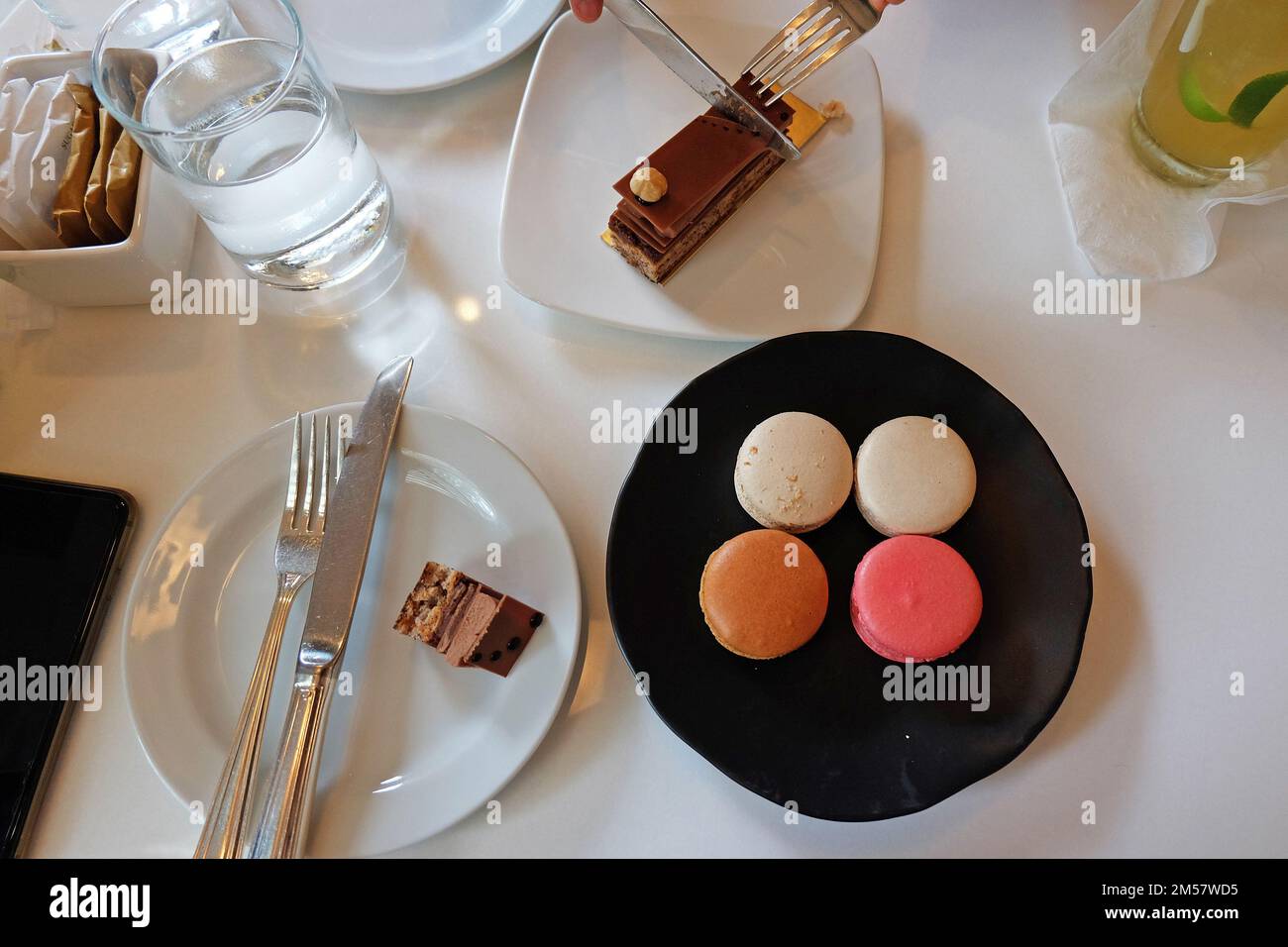 French chocolate opera cake and assorted macaron(macaroon) served with ...