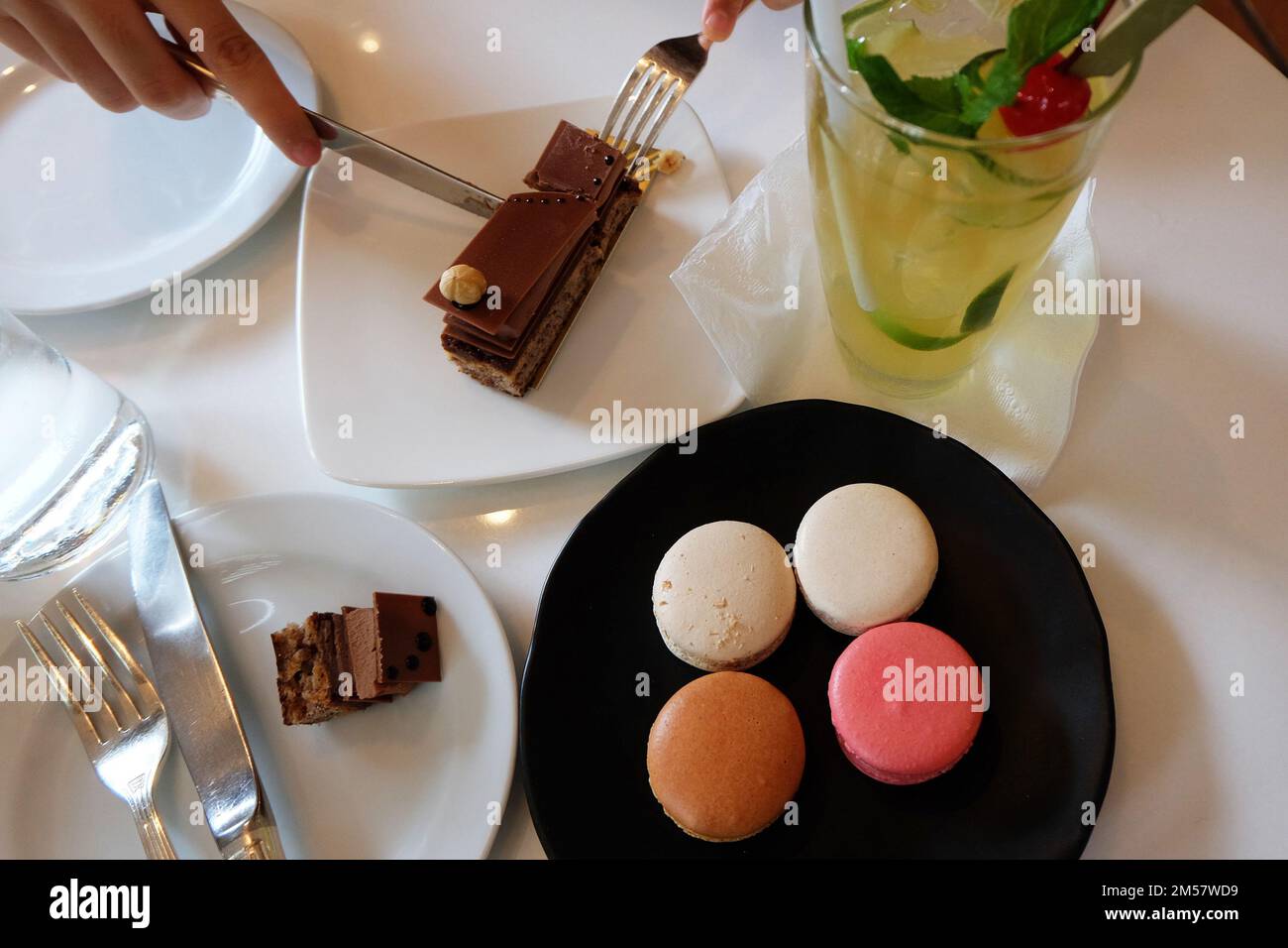 French chocolate opera cake and assorted macaron(macaroon) served with ...