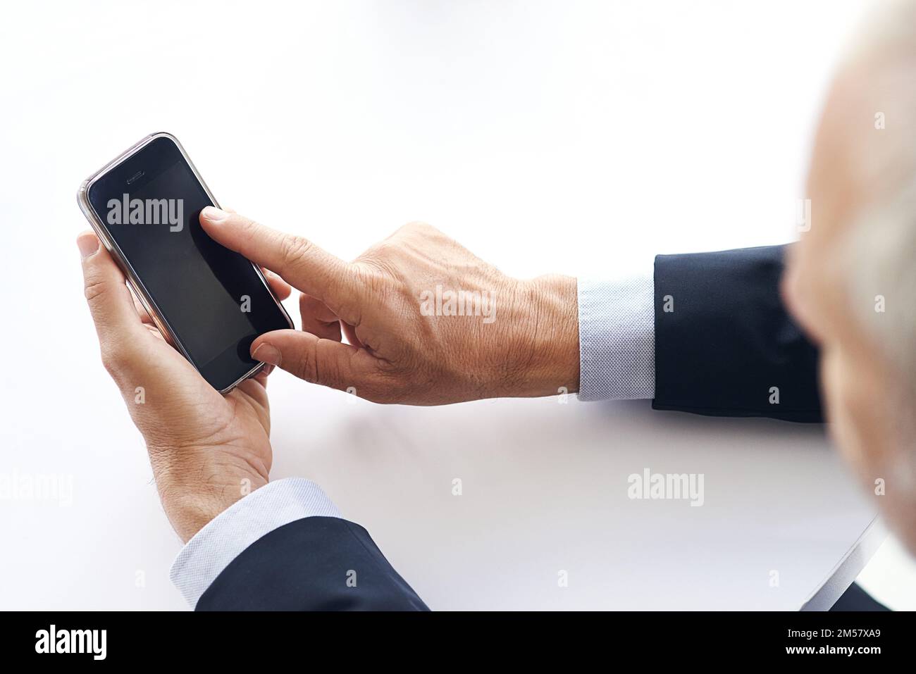 Businessman texting on phone way hi-res stock photography and images ...