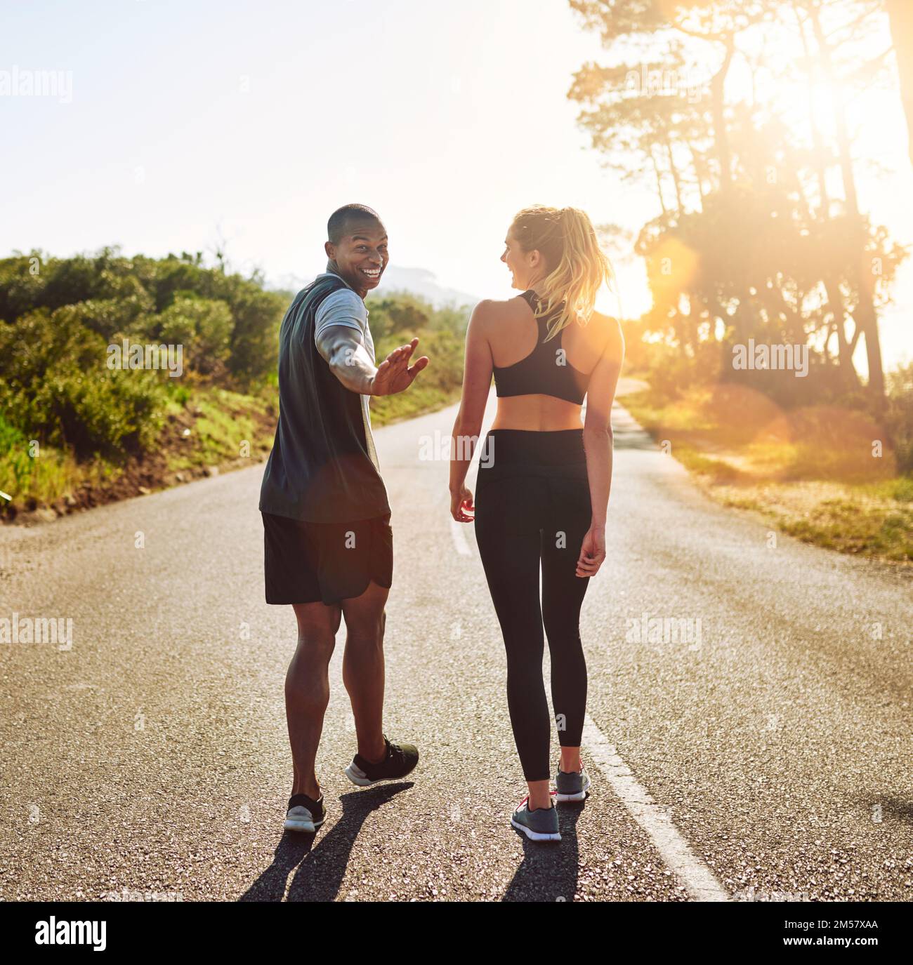 Two men walking down a road hi-res stock photography and images - Alamy