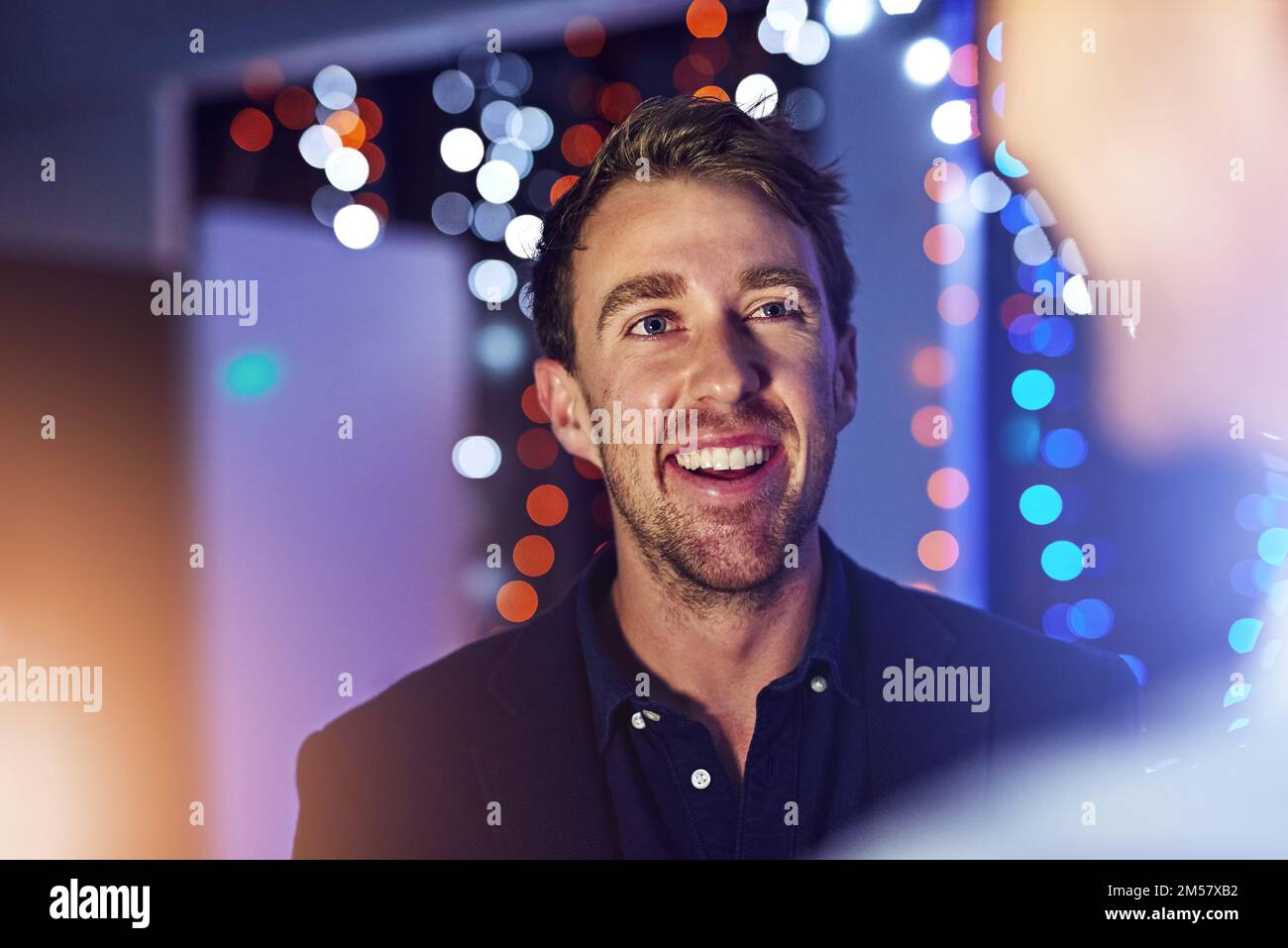 Fancy meeting you here. two people chatting while standing on the ...