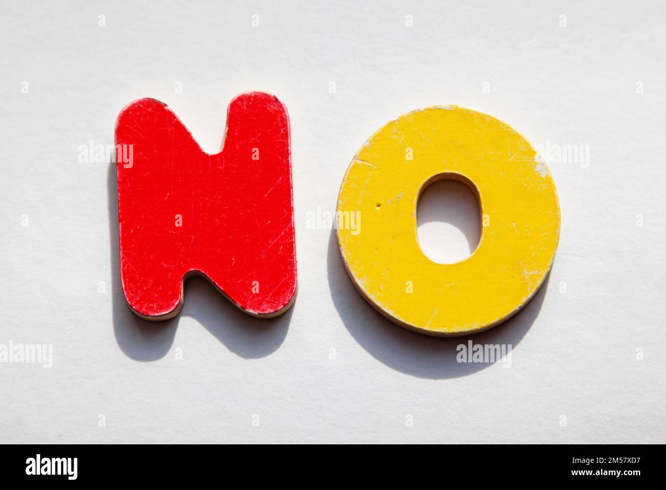 wooden letters form the word No on light background Stock Photo - Alamy