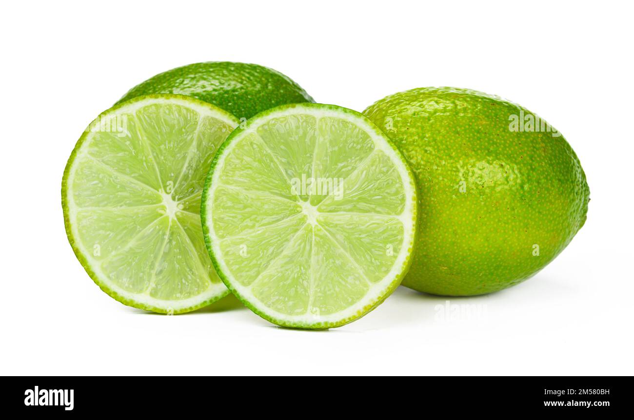 Pieces of lime isolated on white background Stock Photo - Alamy