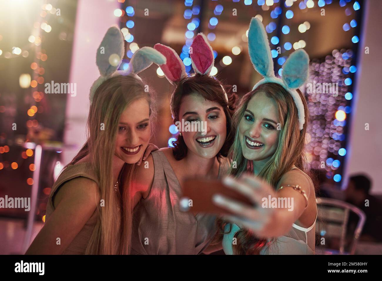 Whats a party without taking some cool pics. a group of friends taking ...